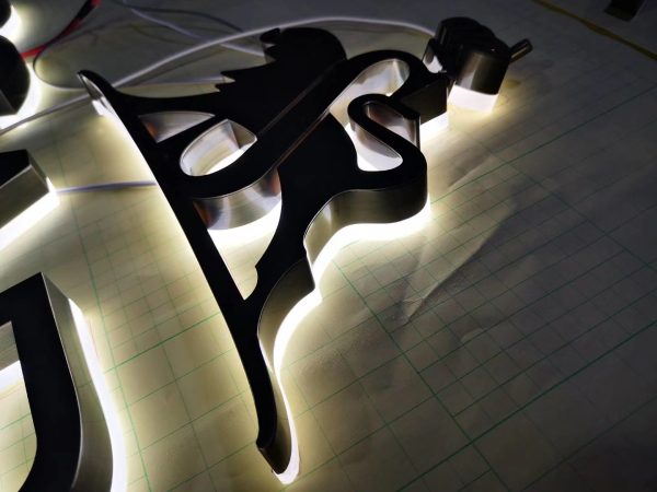 Backlit LED Signs with Brushed and Electroplated Bronze Stainless Steel ...